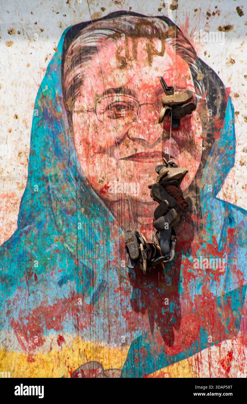 Protest-Marked Portrait of Sheikh Hasina with Hanging Shoes on a City ...
