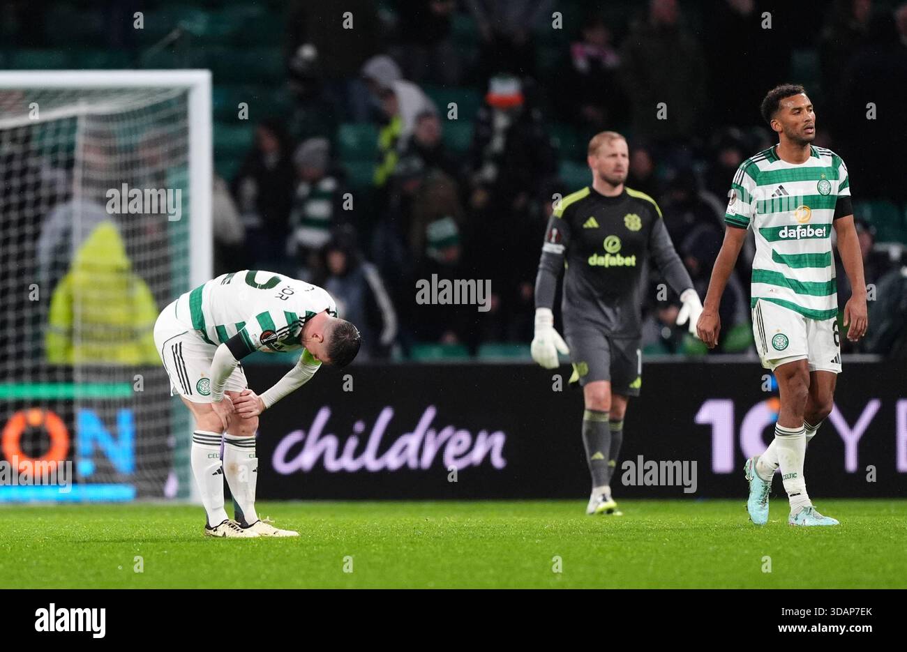 Celtic's Callum McGregor (left) and Auston Trusty (right) appear ...