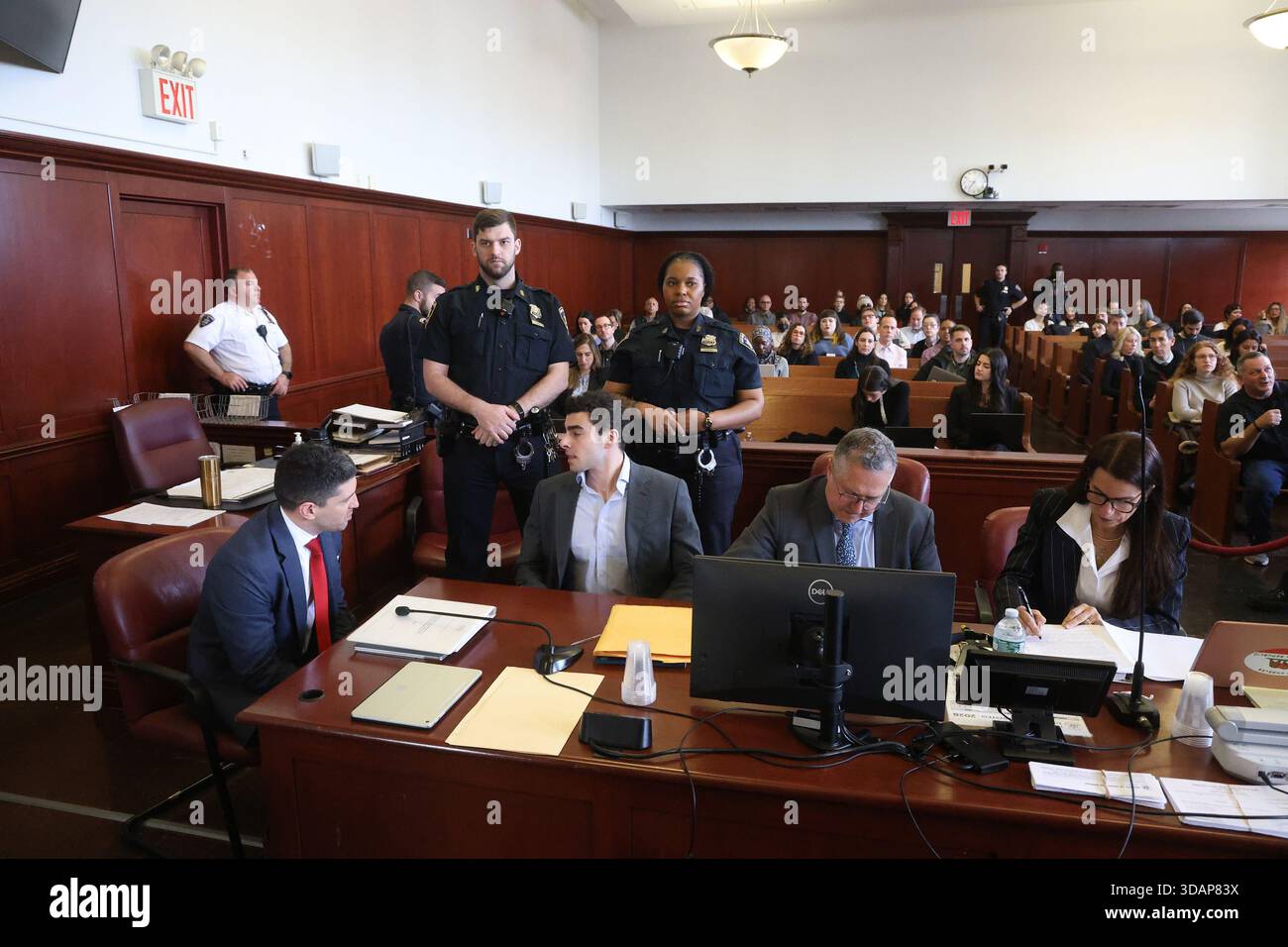 Luigi Mangione, (seated 2nd from left) charged with the murder of Brian ...