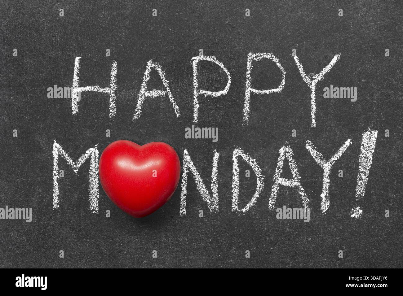 Happy Monday exclamation handwritten on chalkboard with heart symbol ...
