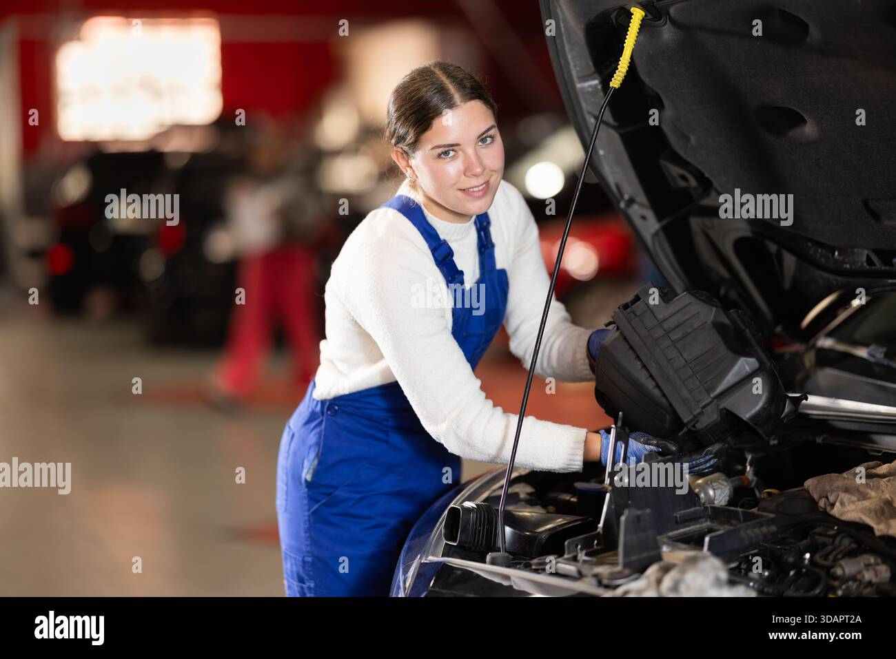 Female auto mechanic inspects hi-res stock photography and images - Alamy