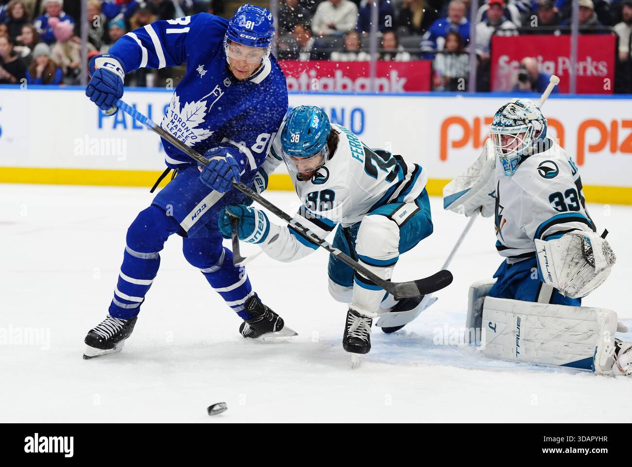 Toronto Maple Leafs' Dakota Joshua (81) and San Jose Sharks' Mario ...