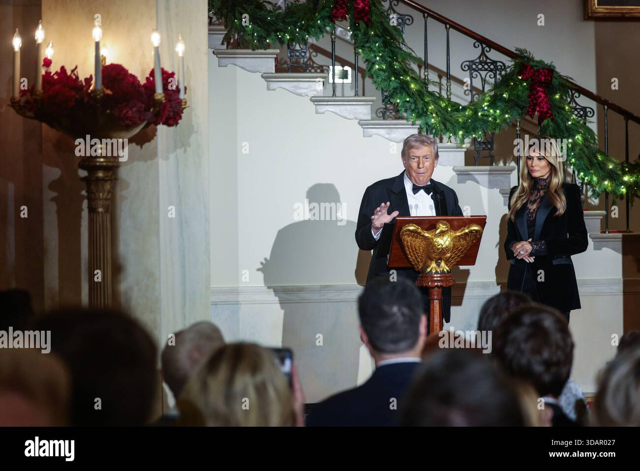 US President Donald J. Trump (C-L) and First Lady Melania Trump (R ...