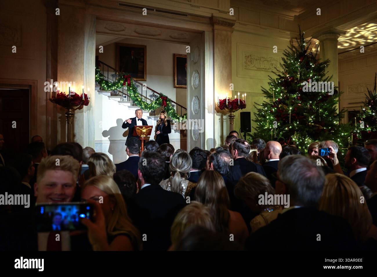 US President Donald J. Trump (C-L) and First Lady Melania Trump (C-R ...