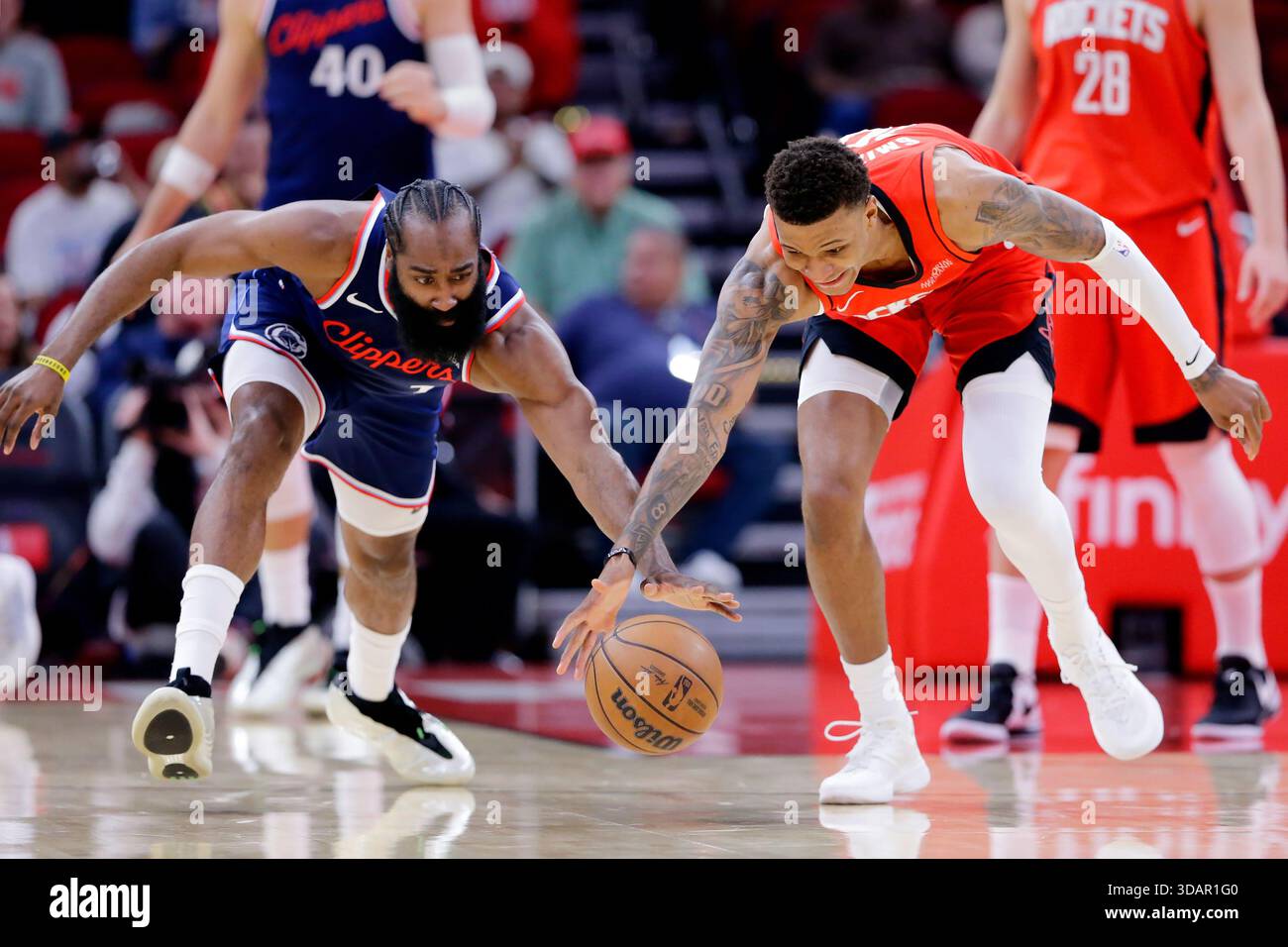LA Clippers guard James Harden, left, and Houston Rockets forward ...