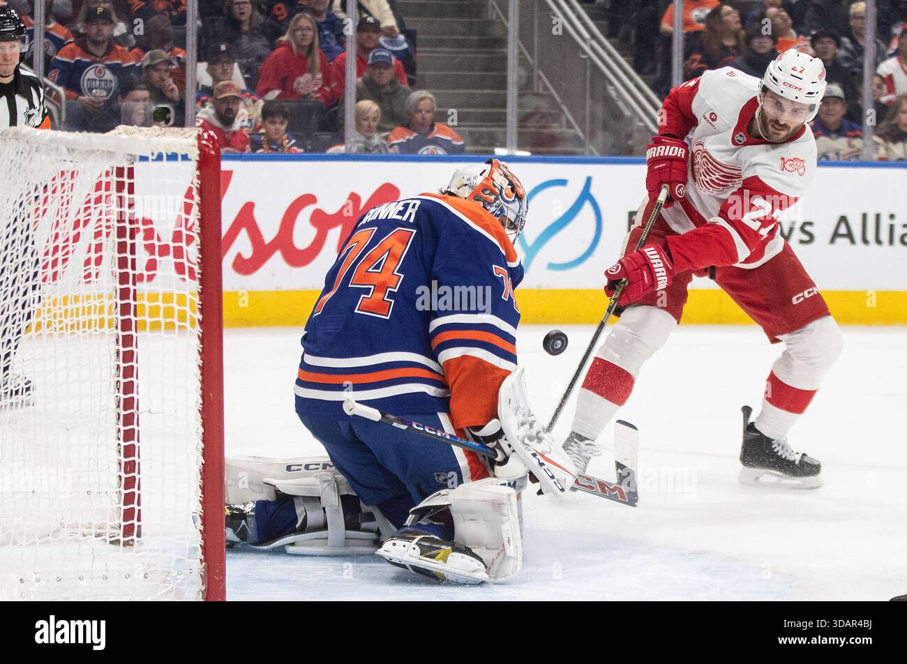 Detroit Red Wings' Michael Rasmussen (27) is stopped by Edmonton Oilers ...