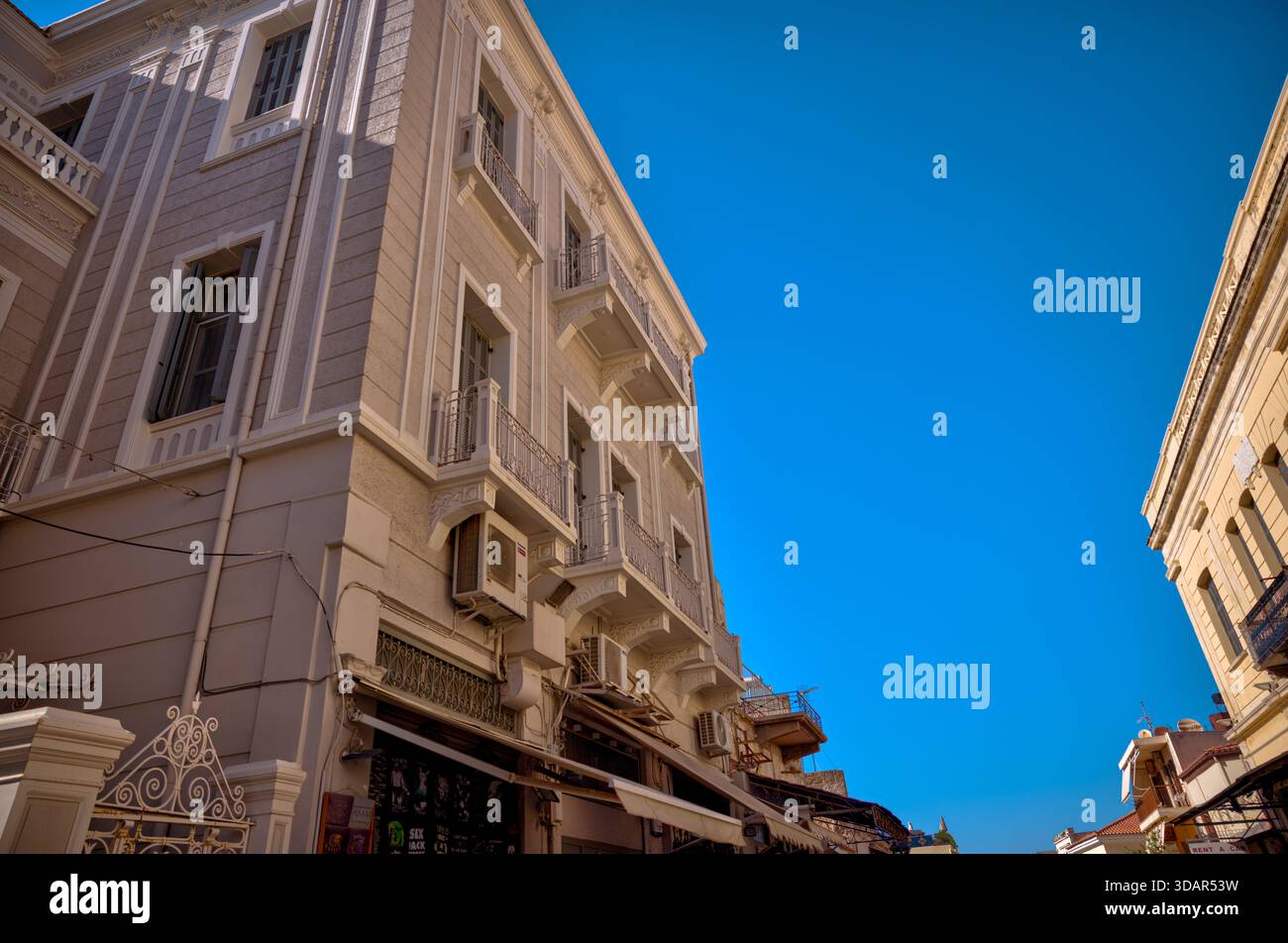 Neoclassical buildings on a narrow street in Chania Old Town, Crete ...