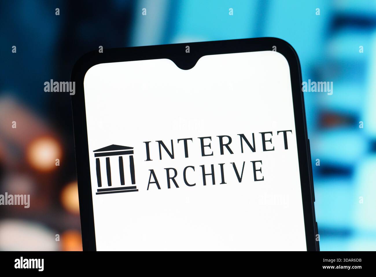 In this photo illustration, the Internet Archive logo is seen displayed ...