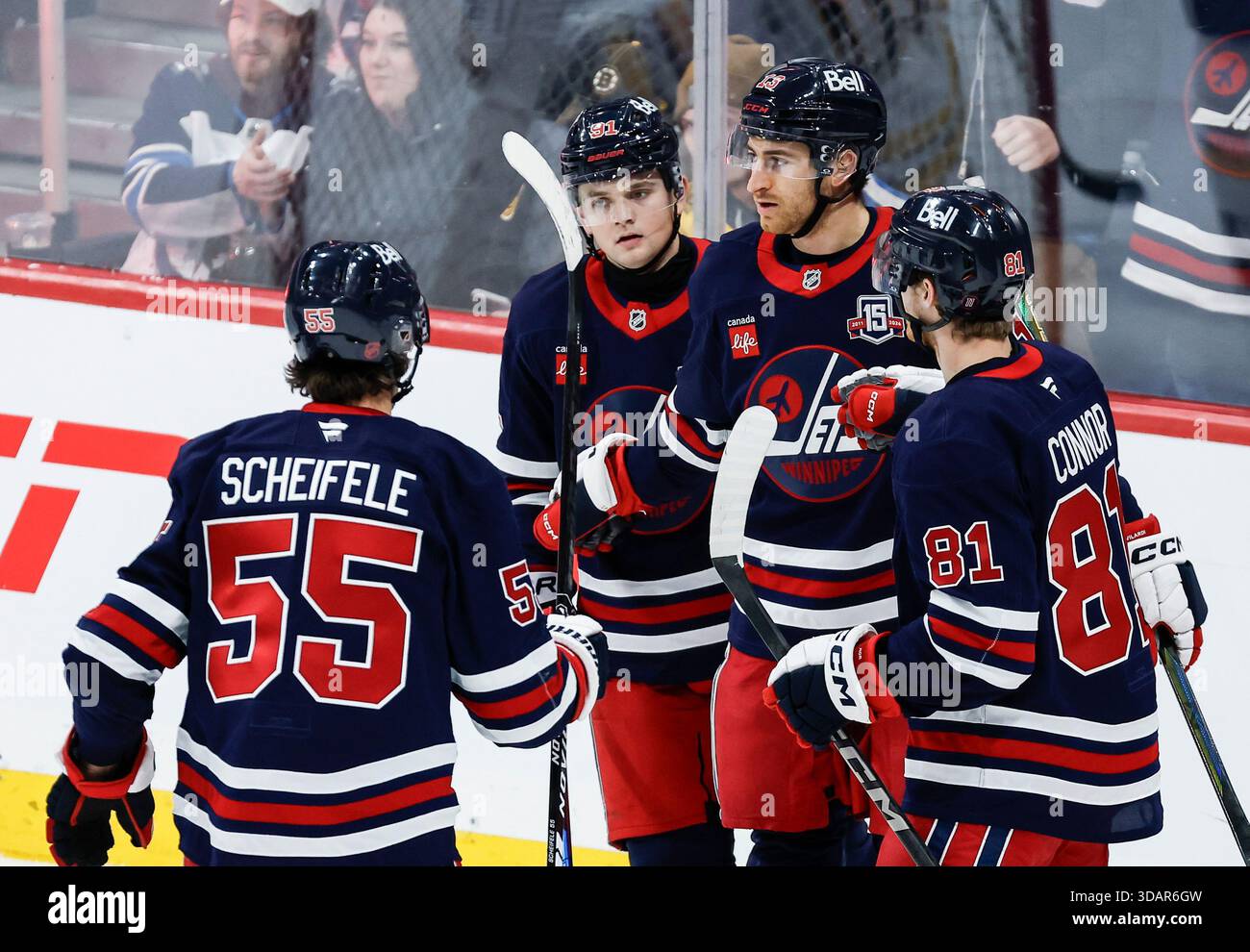 Winnipeg Jets' Mark Scheifele (55), Cole Perfetti (91), Gabriel Vilardi ...