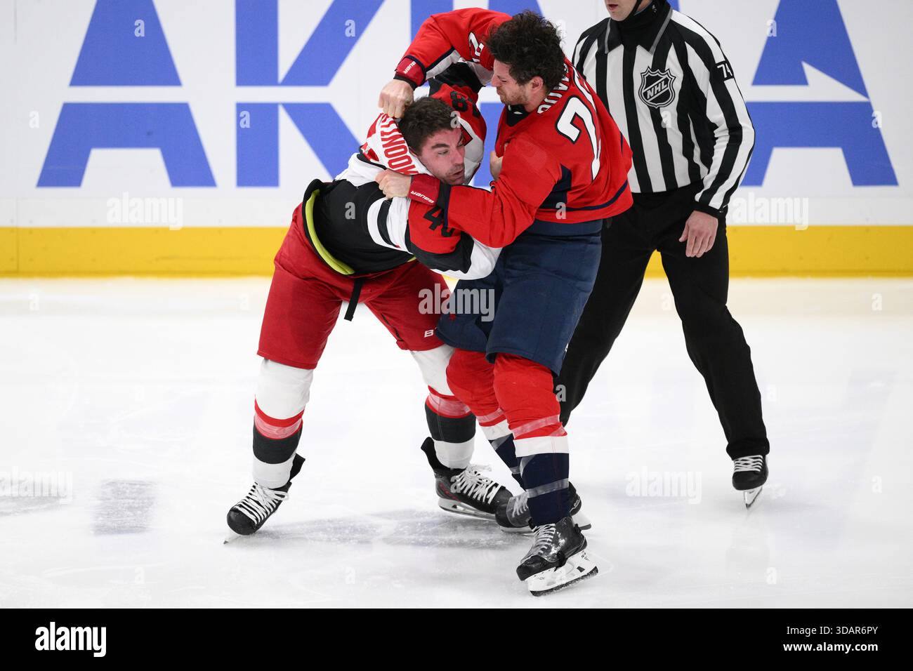 Washington Capitals center Nic Dowd, right, fights with Carolina ...