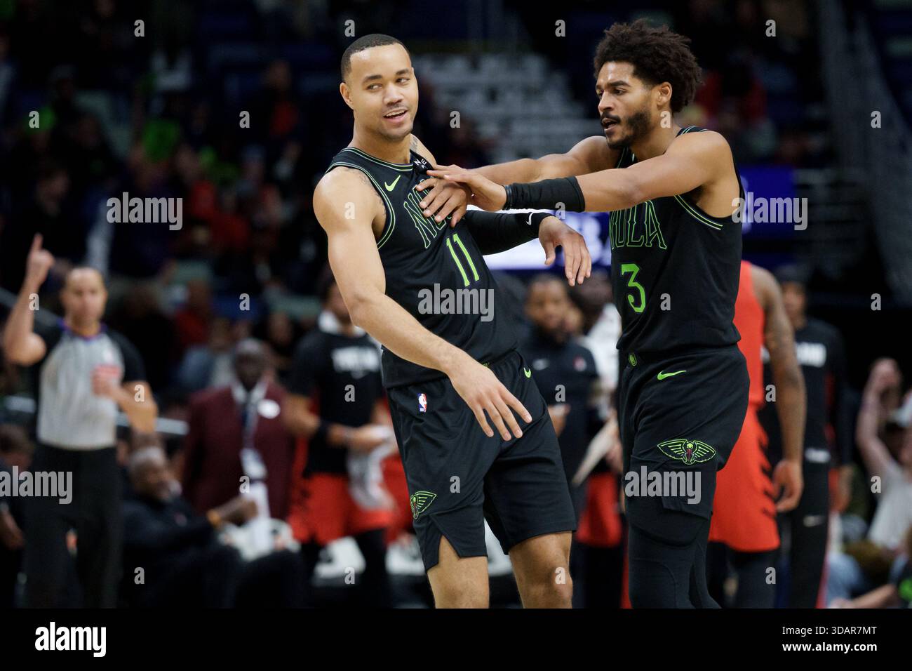 New Orleans Pelicans guard Bryce McGowens (11) and guard Jordan Poole ...