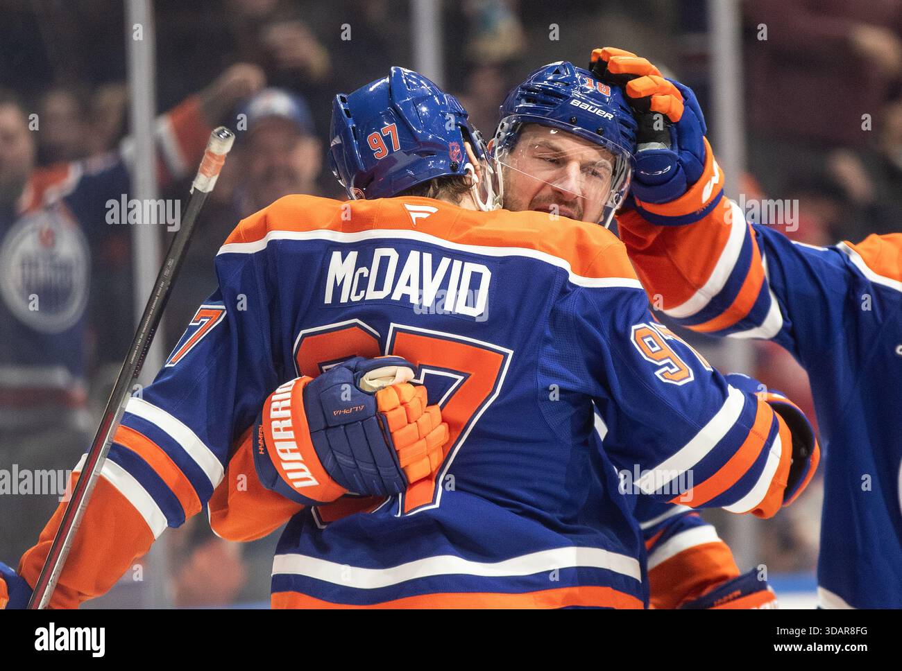 Edmonton Oilers' Connor McDavid (97) and Zach Hyman (18) celebrate a ...