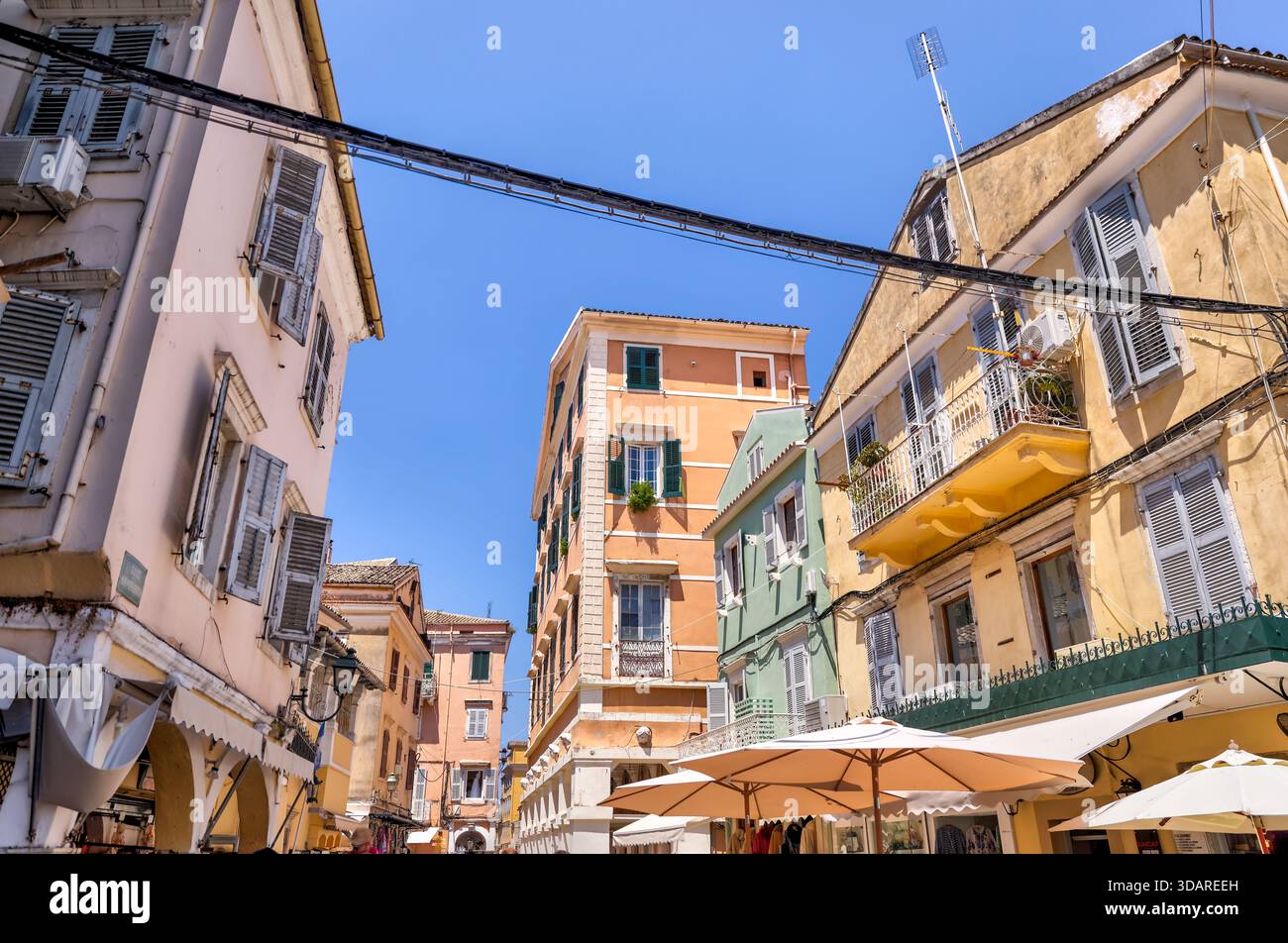 Residential balconies on pastel Venetian era buildings in Corfu Old ...