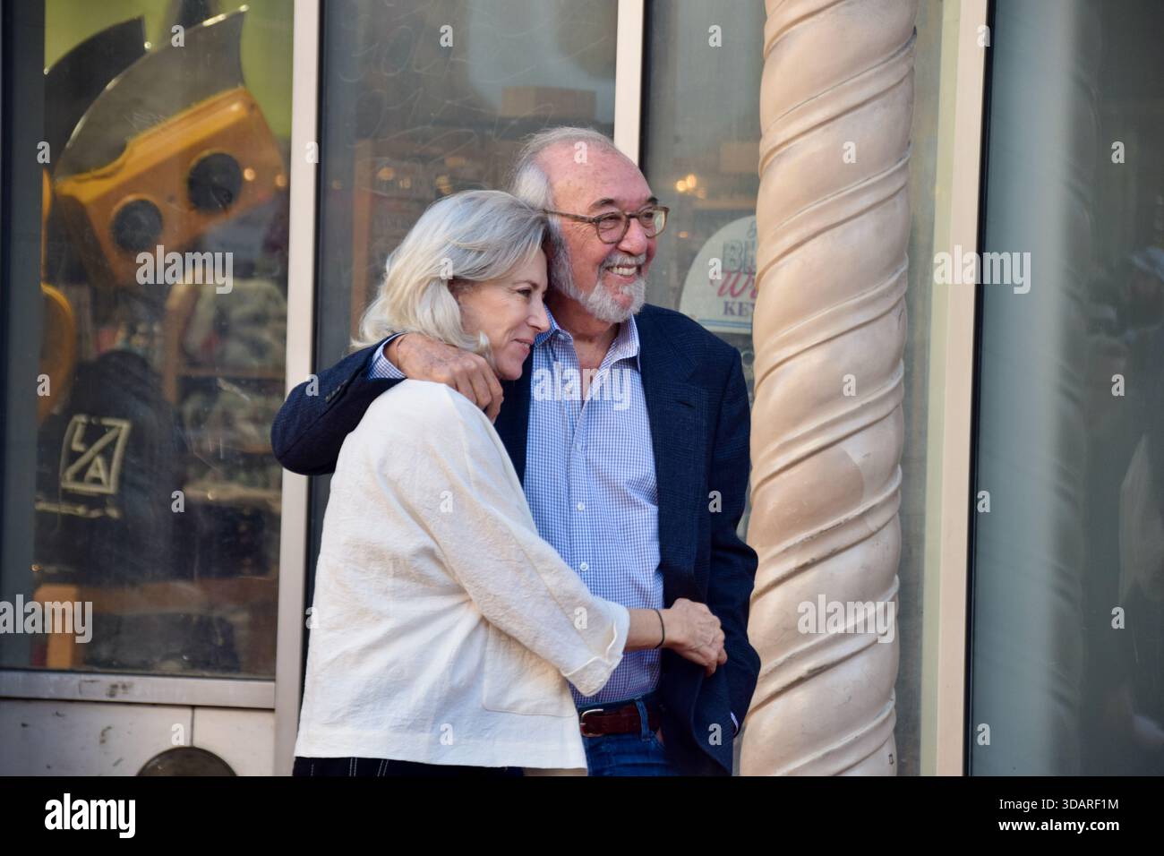 James L. Brooks poses with his wife Jennifer Simchowitz at his ...