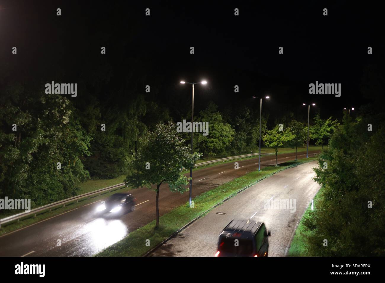 Few cars driving on road hi-res stock photography and images - Alamy