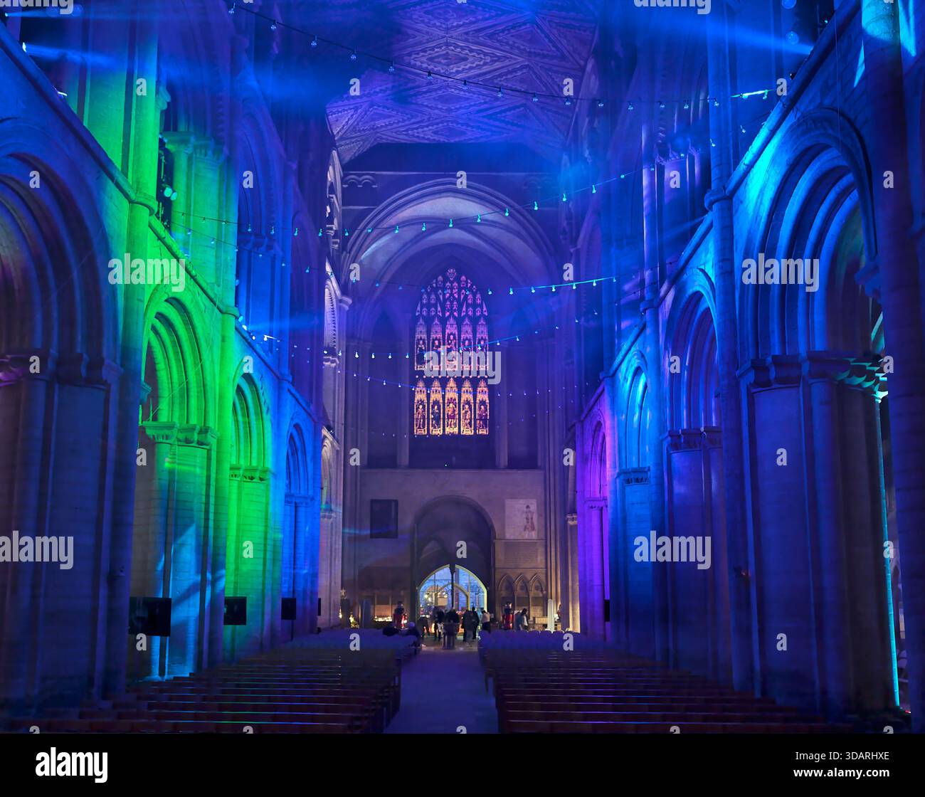 Colourful nave during the christmas light show at Peterborough ...