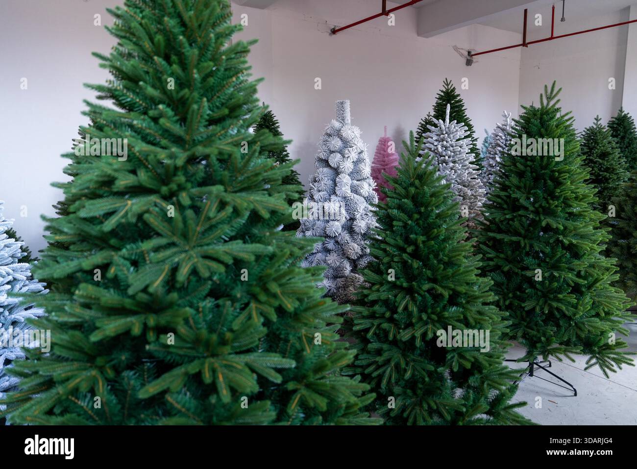Christmas tree products are produced at a workshop in Jinhua City, east ...