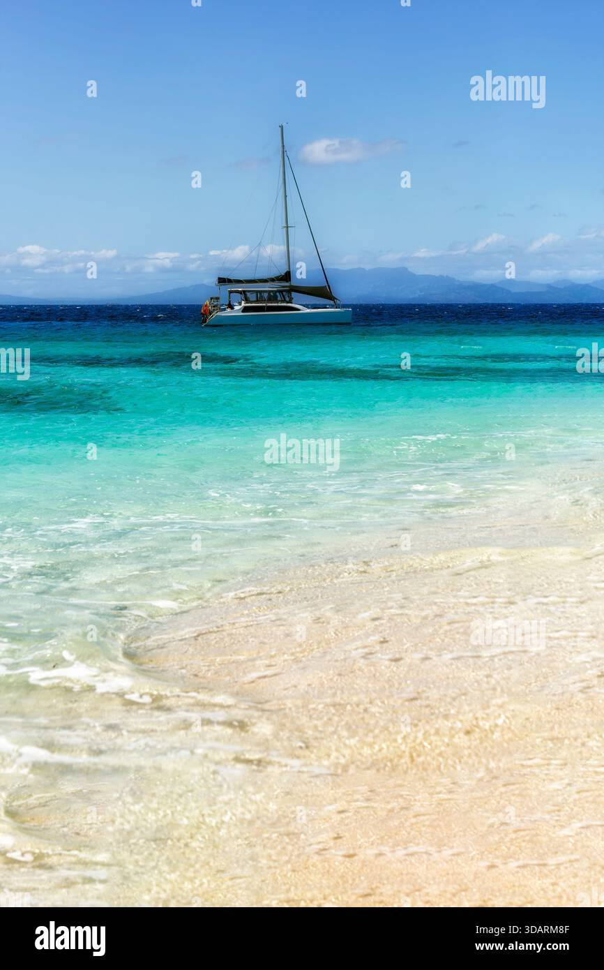 Sail catamaran yacht at Fiji tropical tourism destination islands in ...