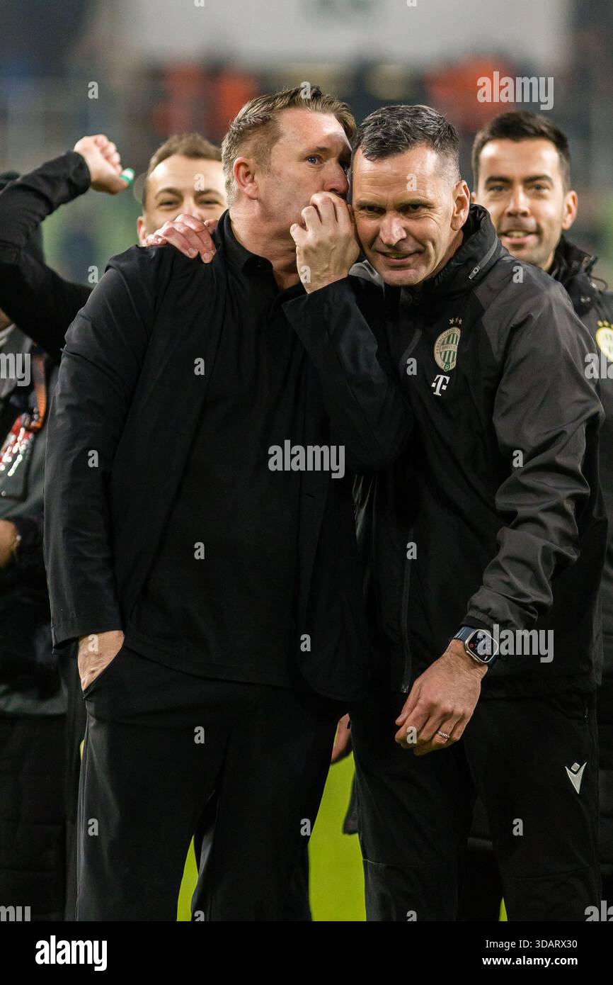 Budapest, Hungary. 11th, December 2025. Head coach Robbie Keane (L) of ...