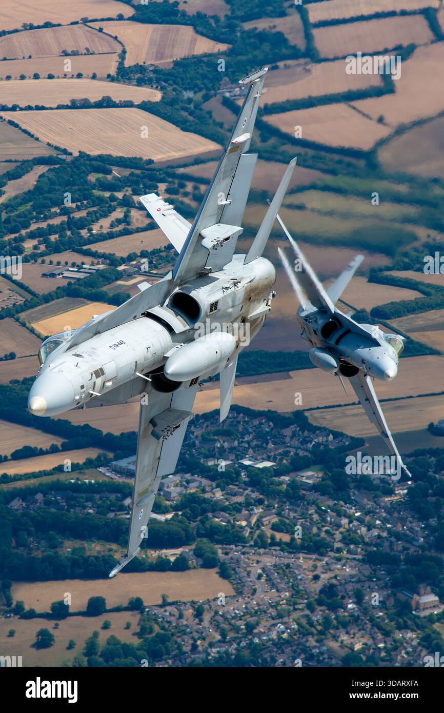 F/A-18C Hornets HN-442 and HN-417 of the Finnish Air Force perform air ...