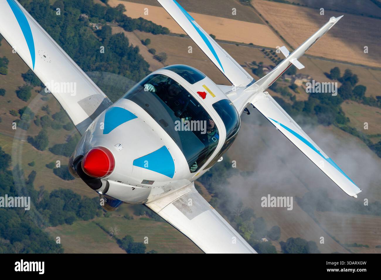 The RAF Grob G120TP Prefect T1 ZM316 is seen in a close air-to-air view ...