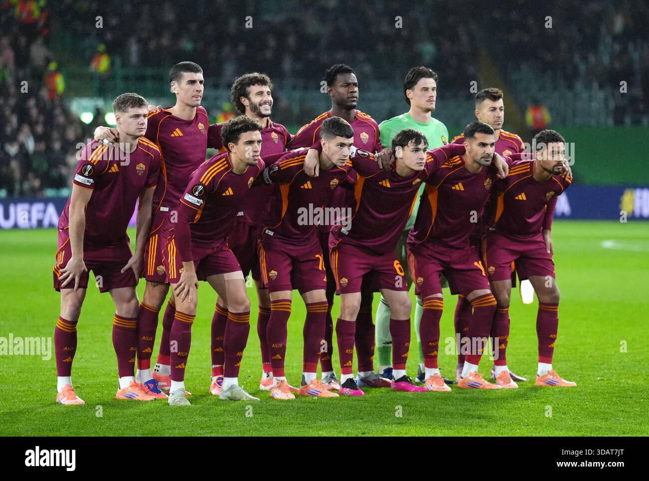 Roma players, back row from left, Evan Ferguson, Gianluca Mancini ...