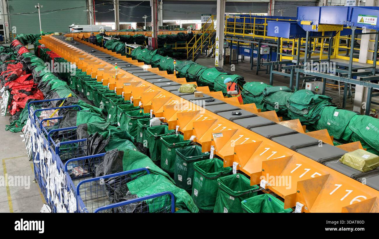 Intelligent sorting equipment is sorting express packages in the ...