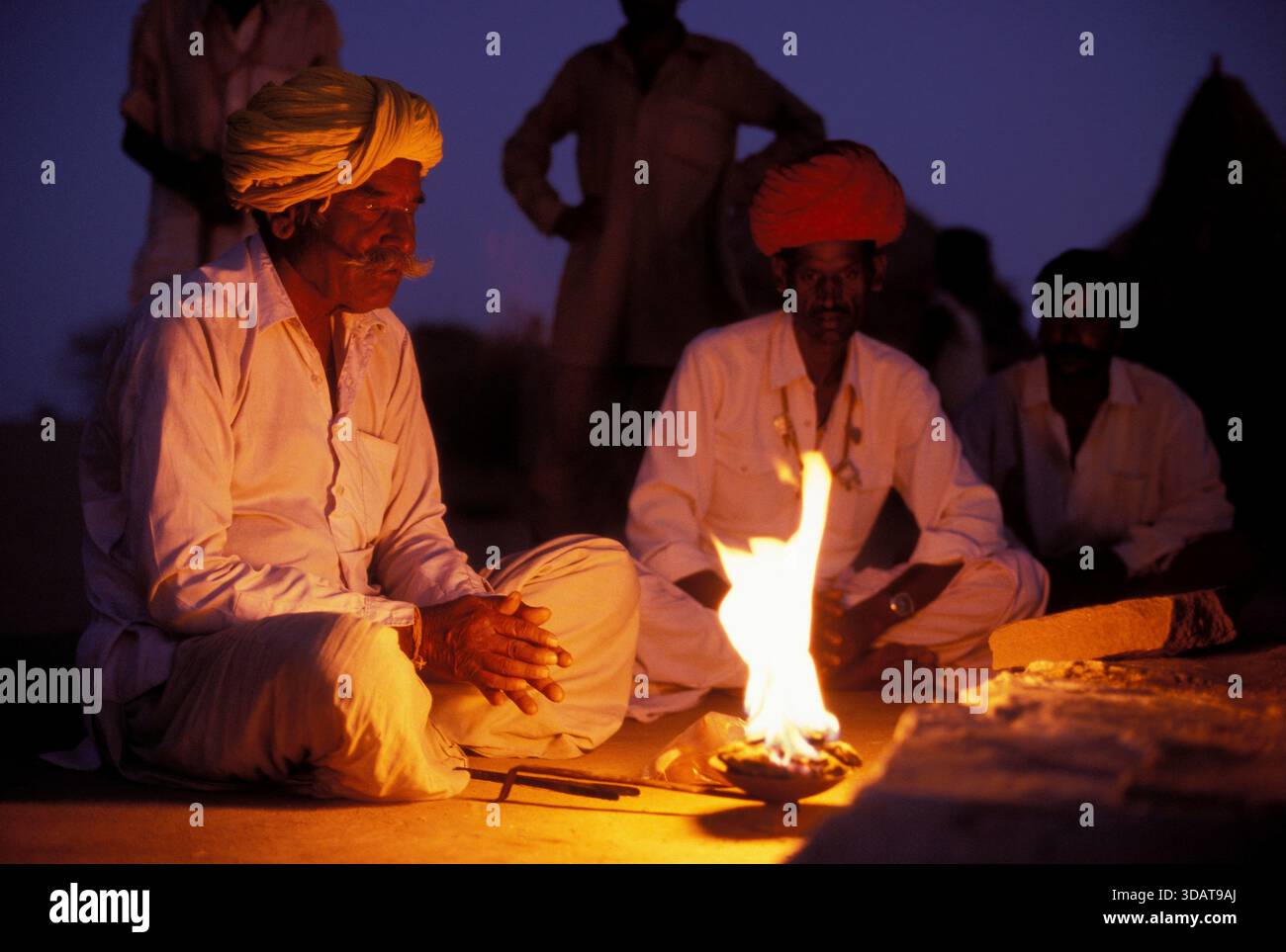 Bhil indigenous men praying, Barjarsar, Rajasthan Desert, India Stock ...