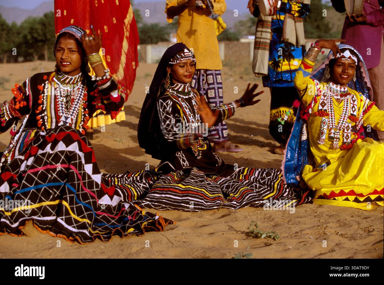 A group of Kalbeliya Gypsy women dance in the Rajasthan Desert, Pushkar ...