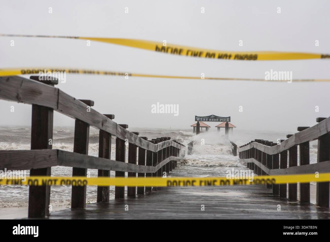 Water washes over the West Side Pier as Hurricane Isaac makes landfall ...