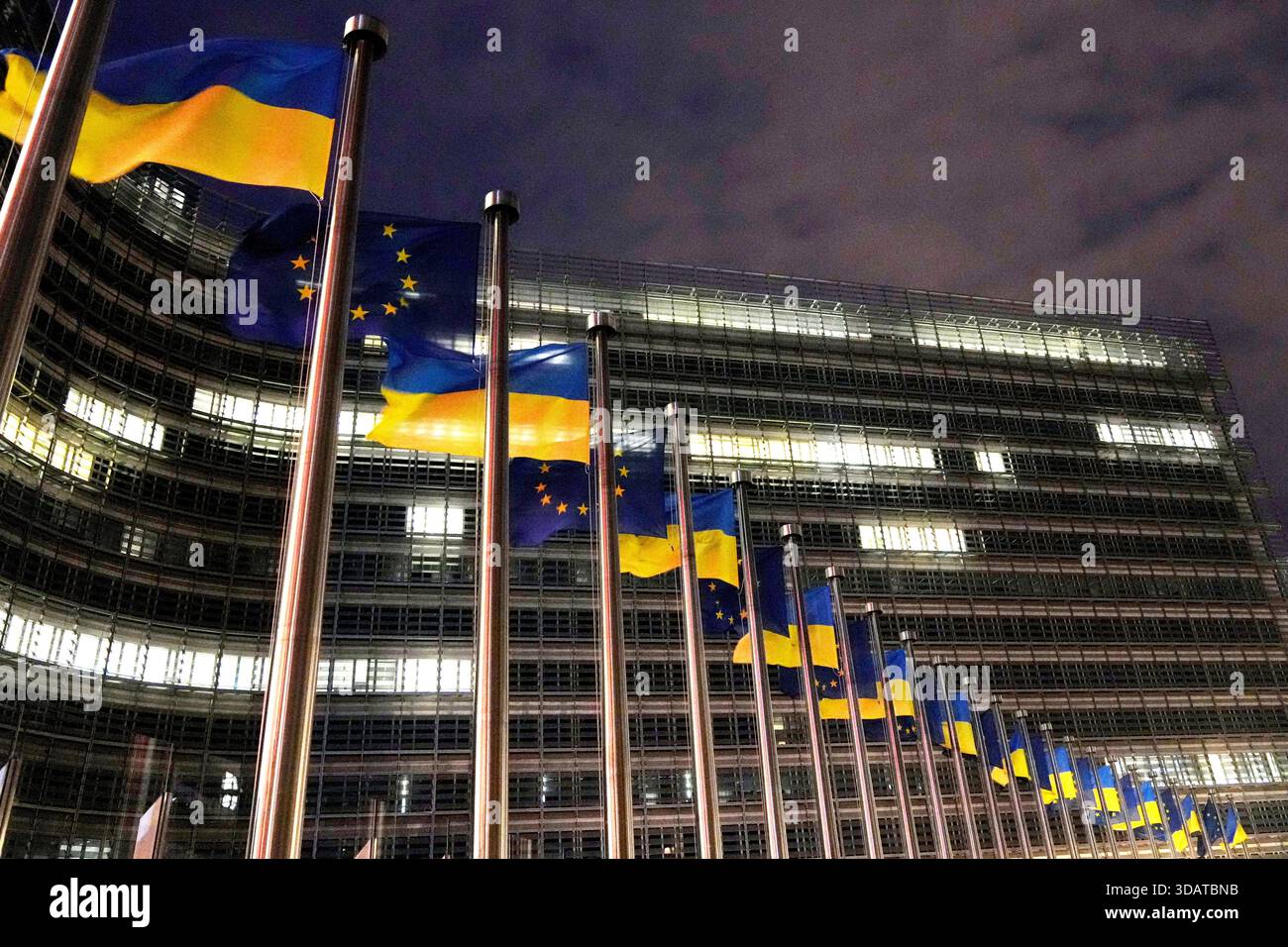 FILE - The European Union and Ukrainian flags flap in the wind to mark ...