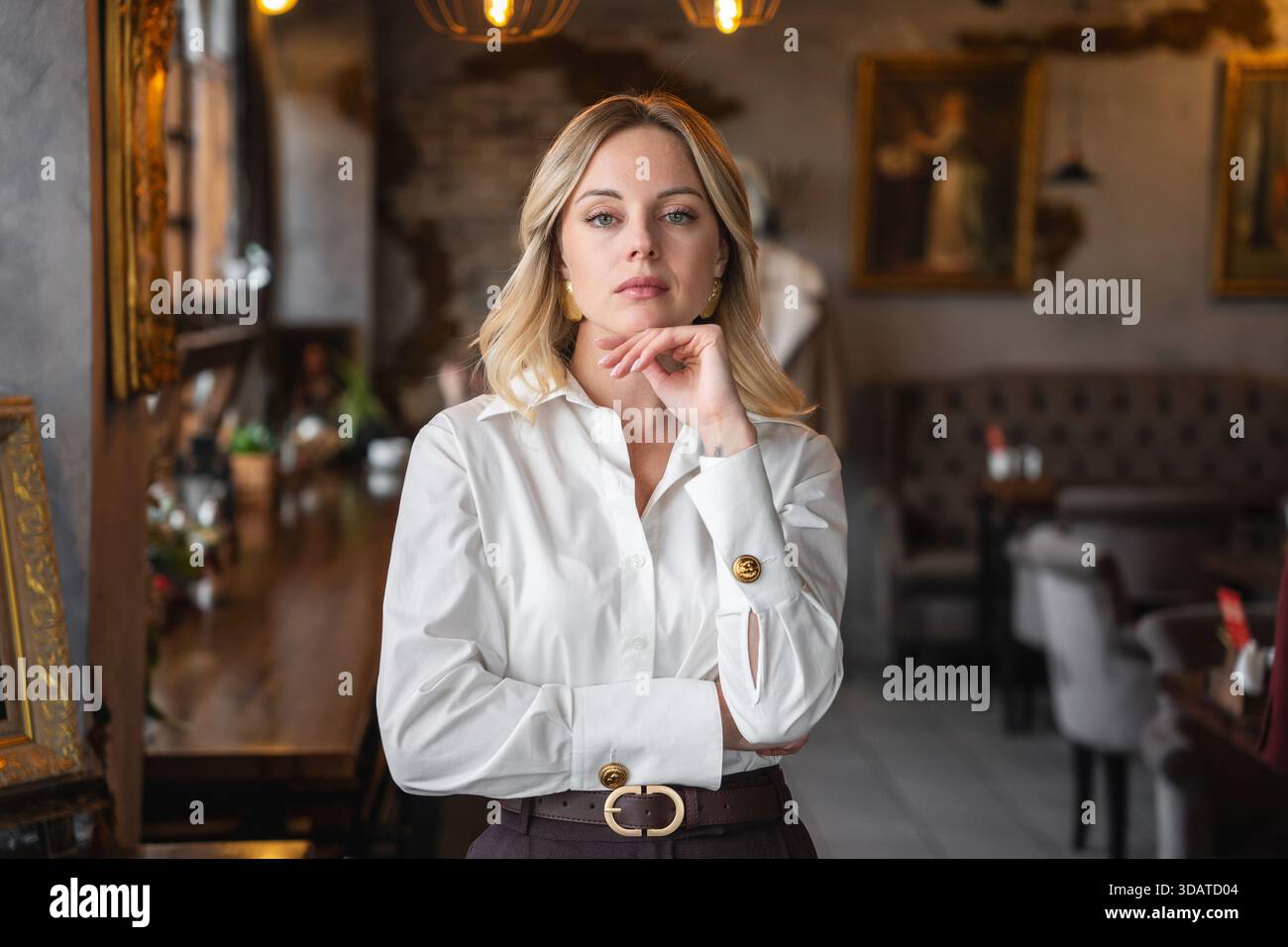 Thoughtful female fashion model hi-res stock photography and images - Alamy