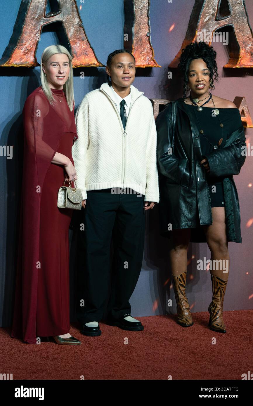 (L-R) Bethany England, Drew Spence and guest attend the "Avatar: Fire ...