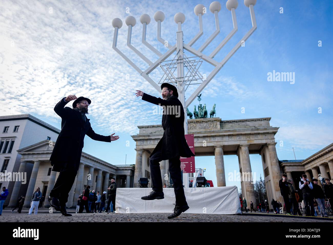 12 December 2025, Berlin: Yehuda Teichtal (l), Orthodox rabbi, and ...