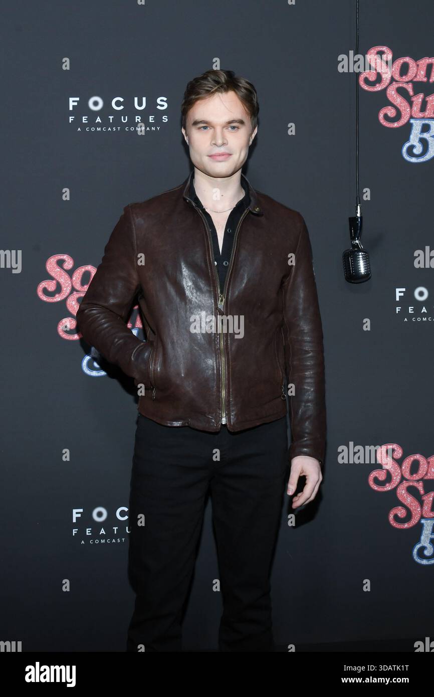 John Beckwith attends the "Song Sung Blue" New York Premiere at AMC ...