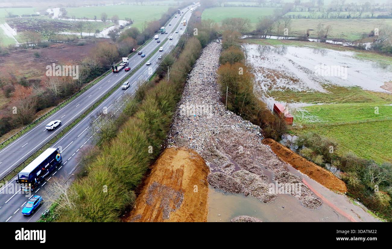 The 150m long mountain of rubbish that has been illegally dumped beside ...