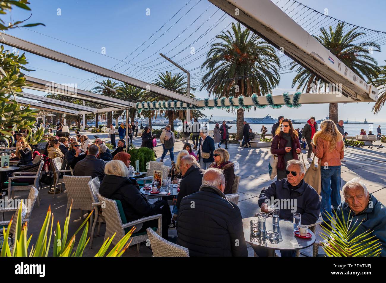 With beautiful weather, the sun emerged and illuminated Split's Riva ...