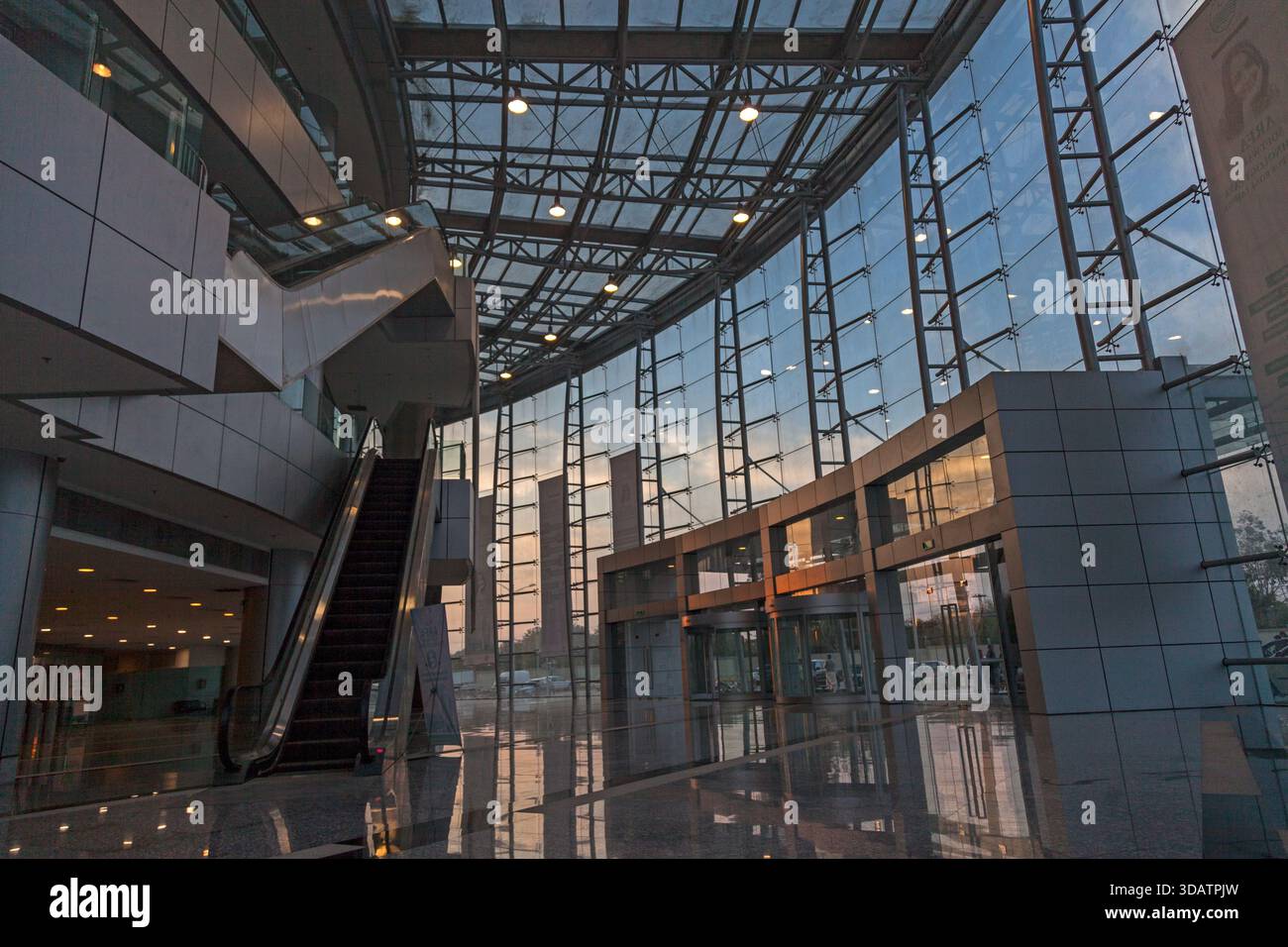 View of the Arfa Kareem Tower's expansive glass facade reflecting the ...