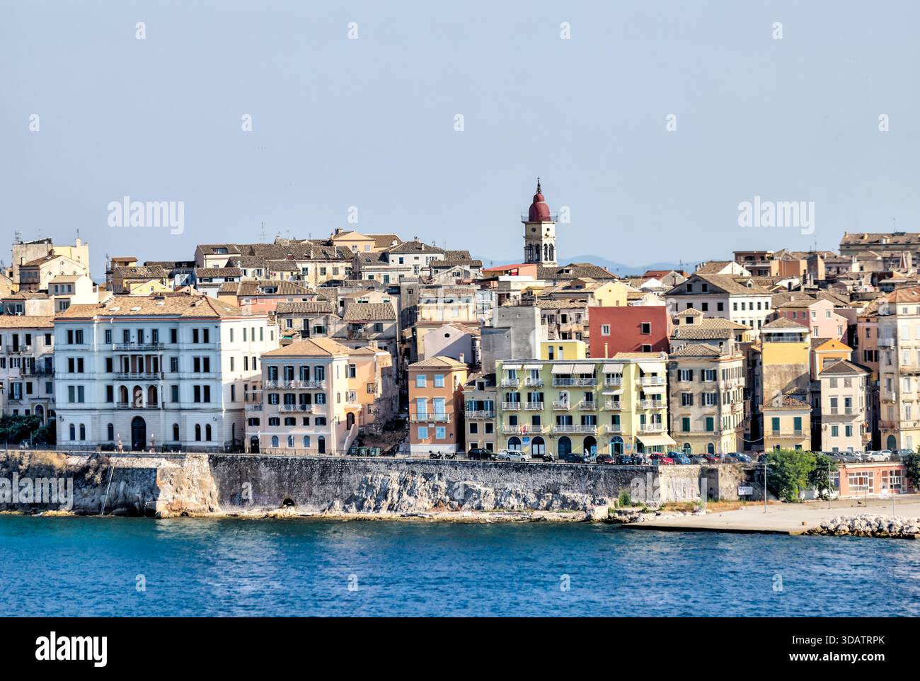 Colorful historic buildings lining the waterfront of Corfu Old Town ...
