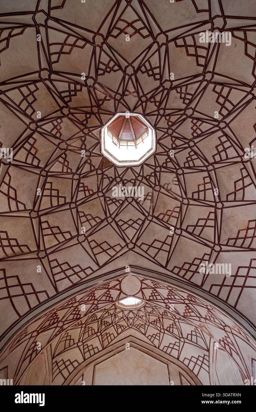 View of geometric patterns dance across the vaulted ceiling, leading ...