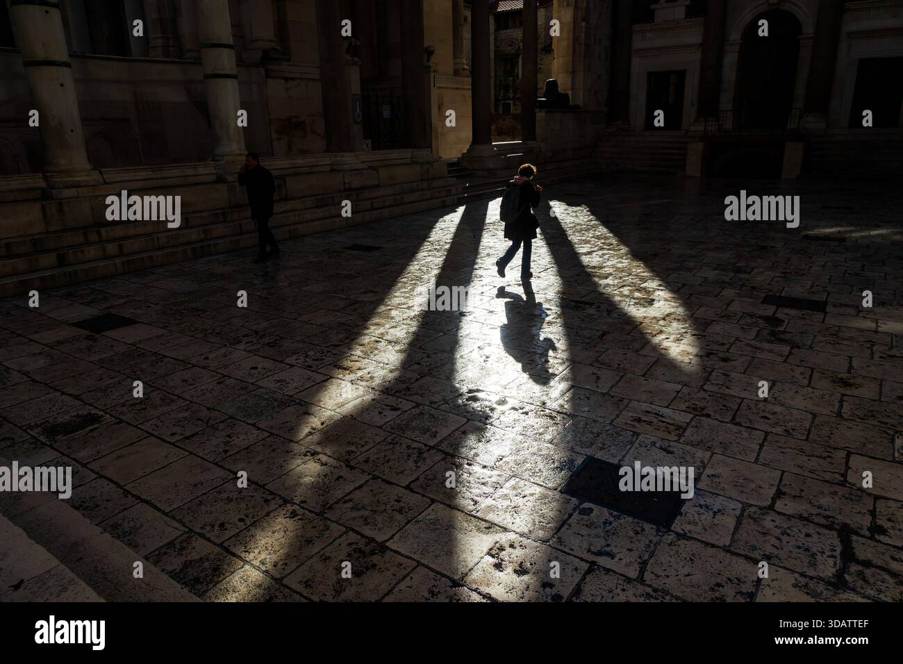 Shadows created by the low winter sun on Peristyle Square, which was ...