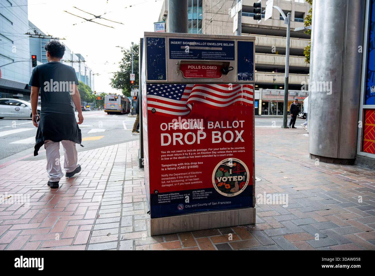 Official ballot drop box with US flag graphic on a brick sidewalk at an ...