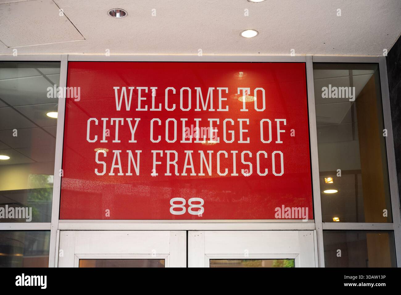 Sign reading "Welcome to City College of San Francisco" above glass ...