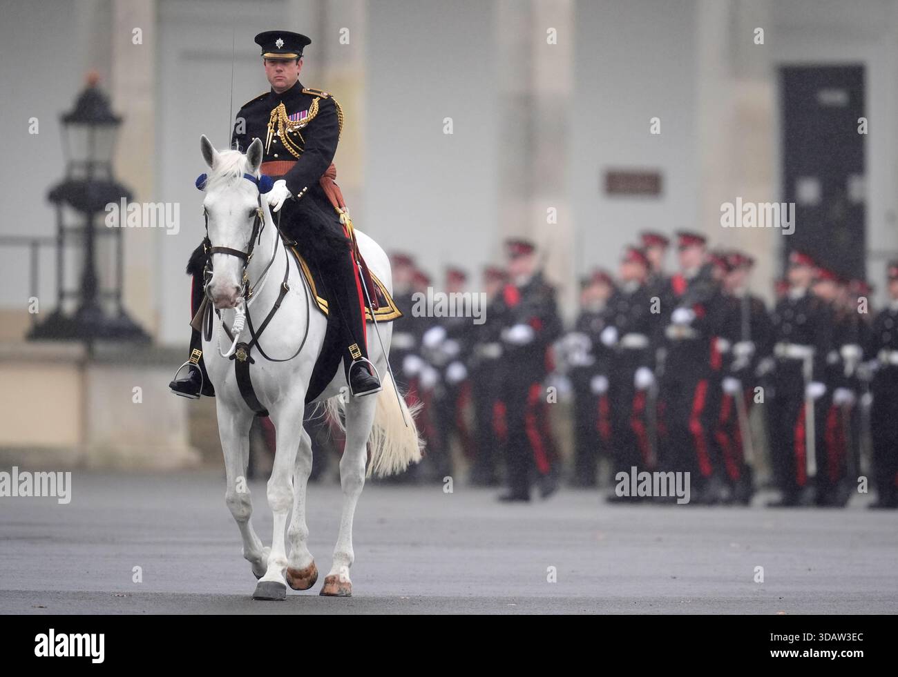 Academy Adjutant Major Ben Kendall rides horse Otto onto the parade ...