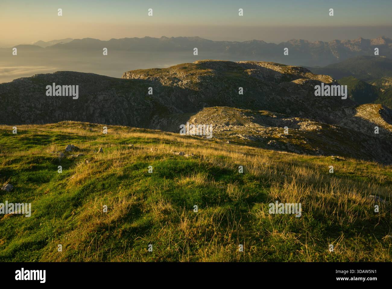 Aerial view of Tosc capturing the golden hour's glow on the rugged ...