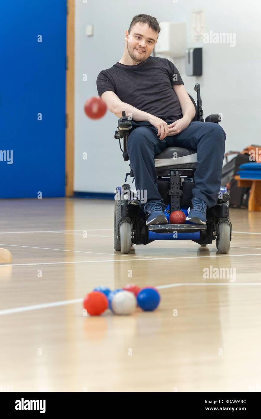 Boccia player with cerebral palsy engage in a training session. They ...