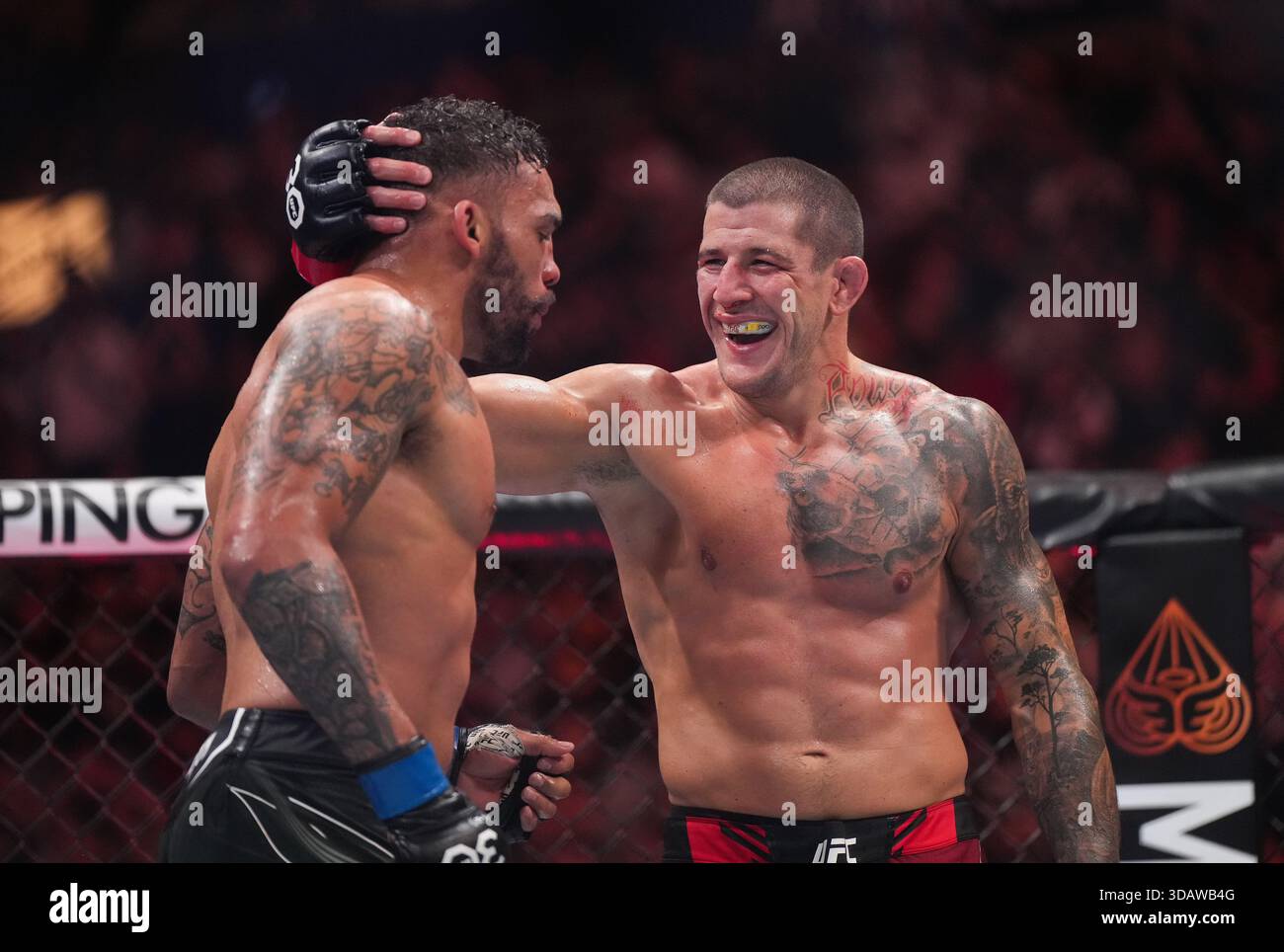 Marc-Andre Barriault, right, embraces Eryk Anders after their fight ...