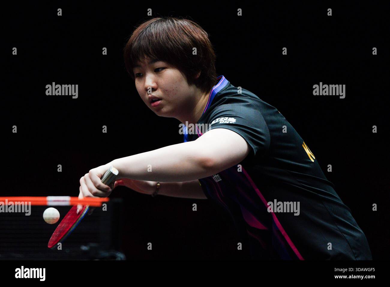 Kuai Man, a Chinese table tennis player during the game at WTT finals ...