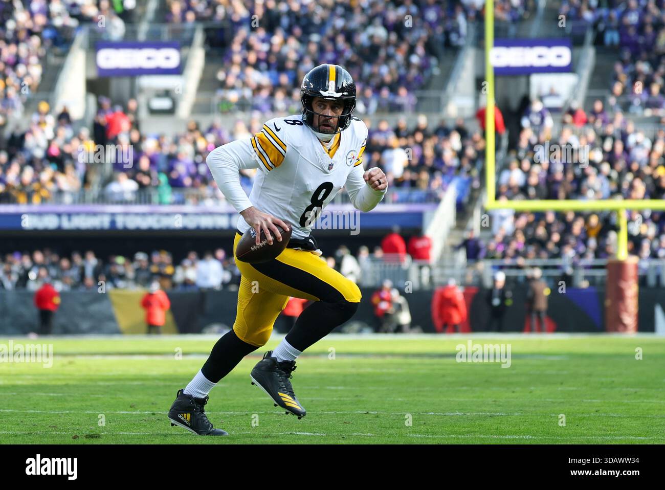 Pittsburgh Steelers quarterback Aaron Rodgers (8) runs the ball for a ...