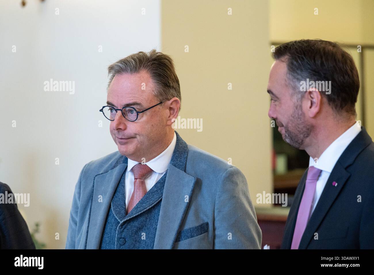 Bart De Wever and Maxime Prévot participate in a handshake during the ...